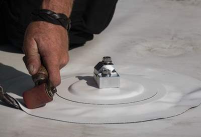 Snow Guards for Membrane Roofs